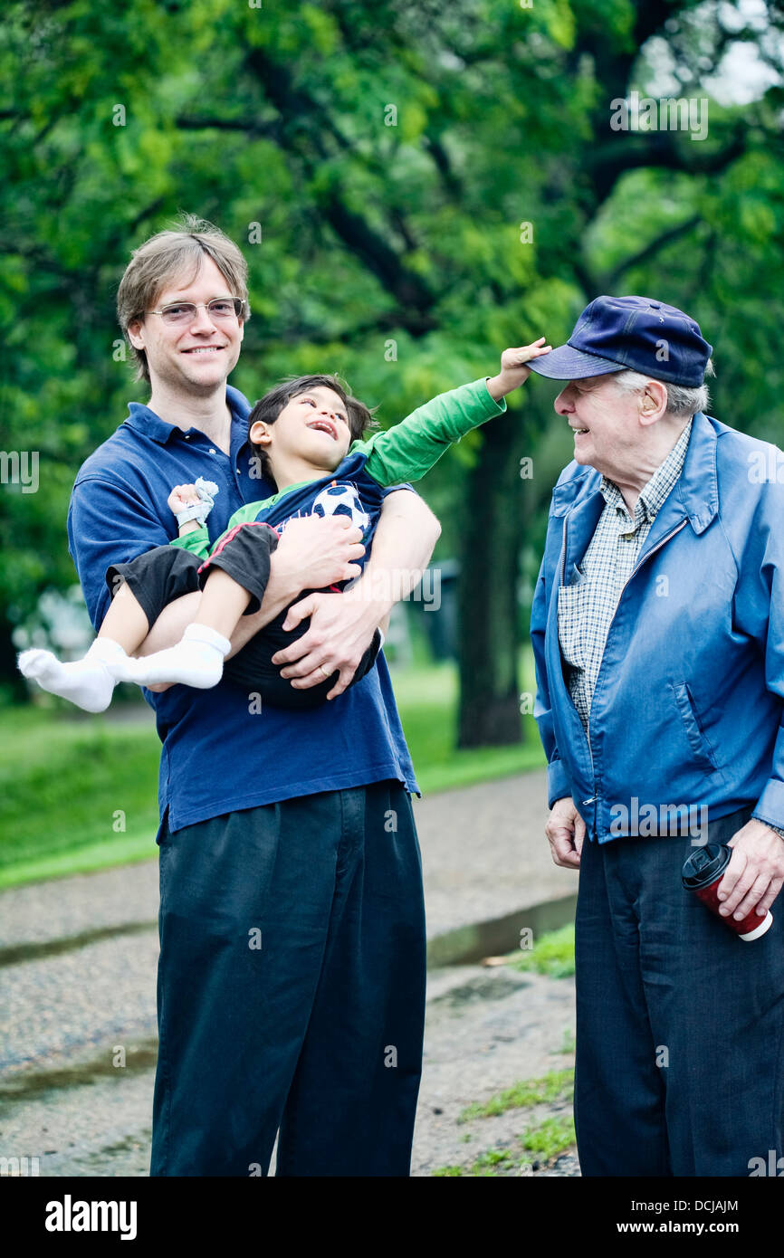 Three generations interacting together Stock Photo - Alamy