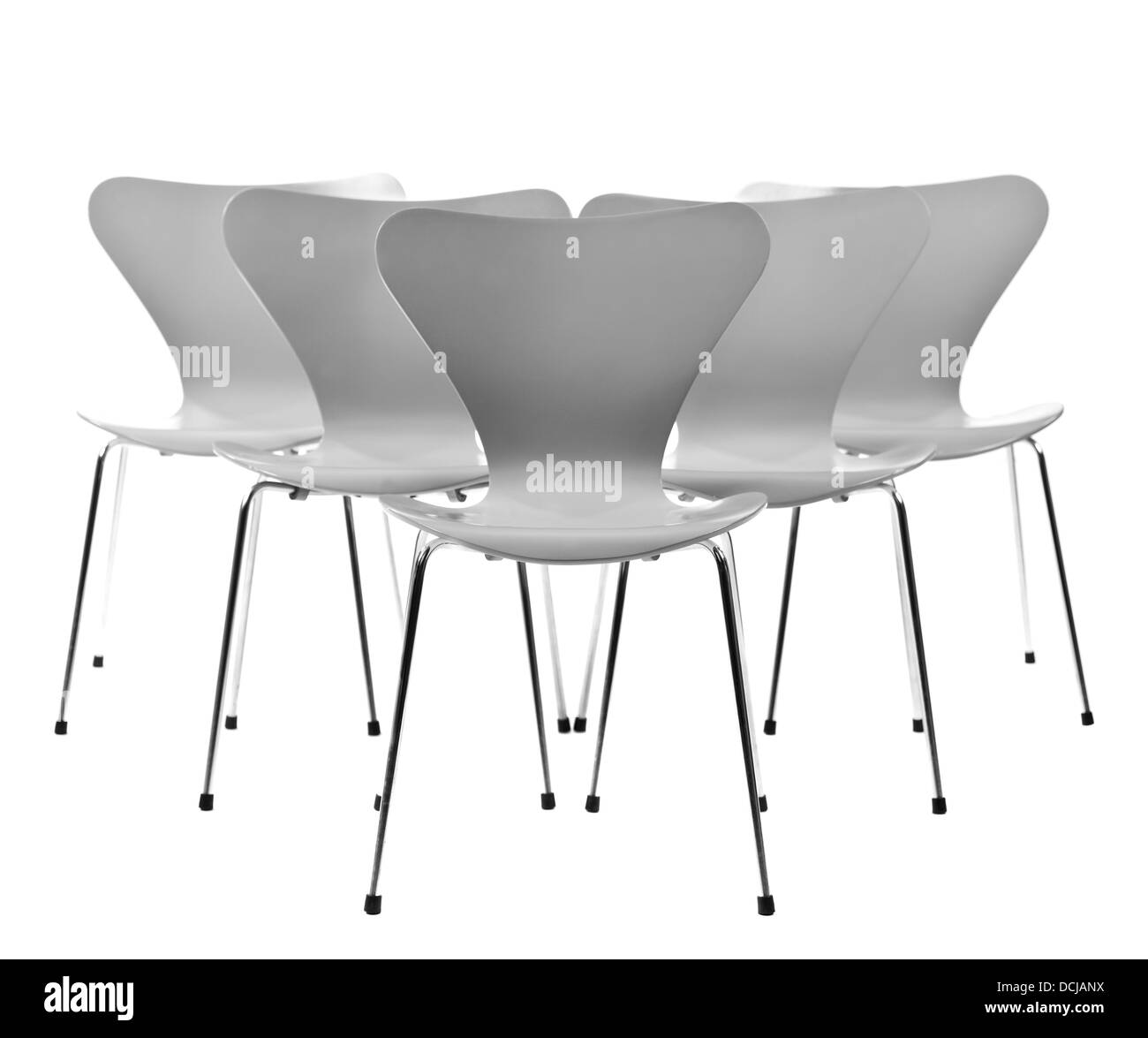 Five chairs in a formation Stock Photo - Alamy