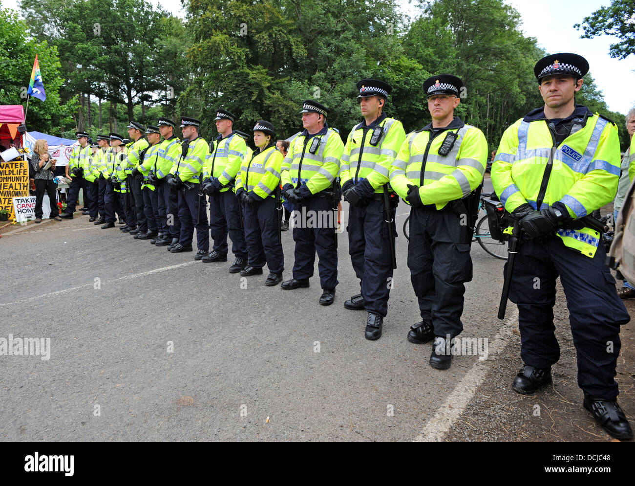 A line of police ready to stop anti fracking protesters who have set up ...