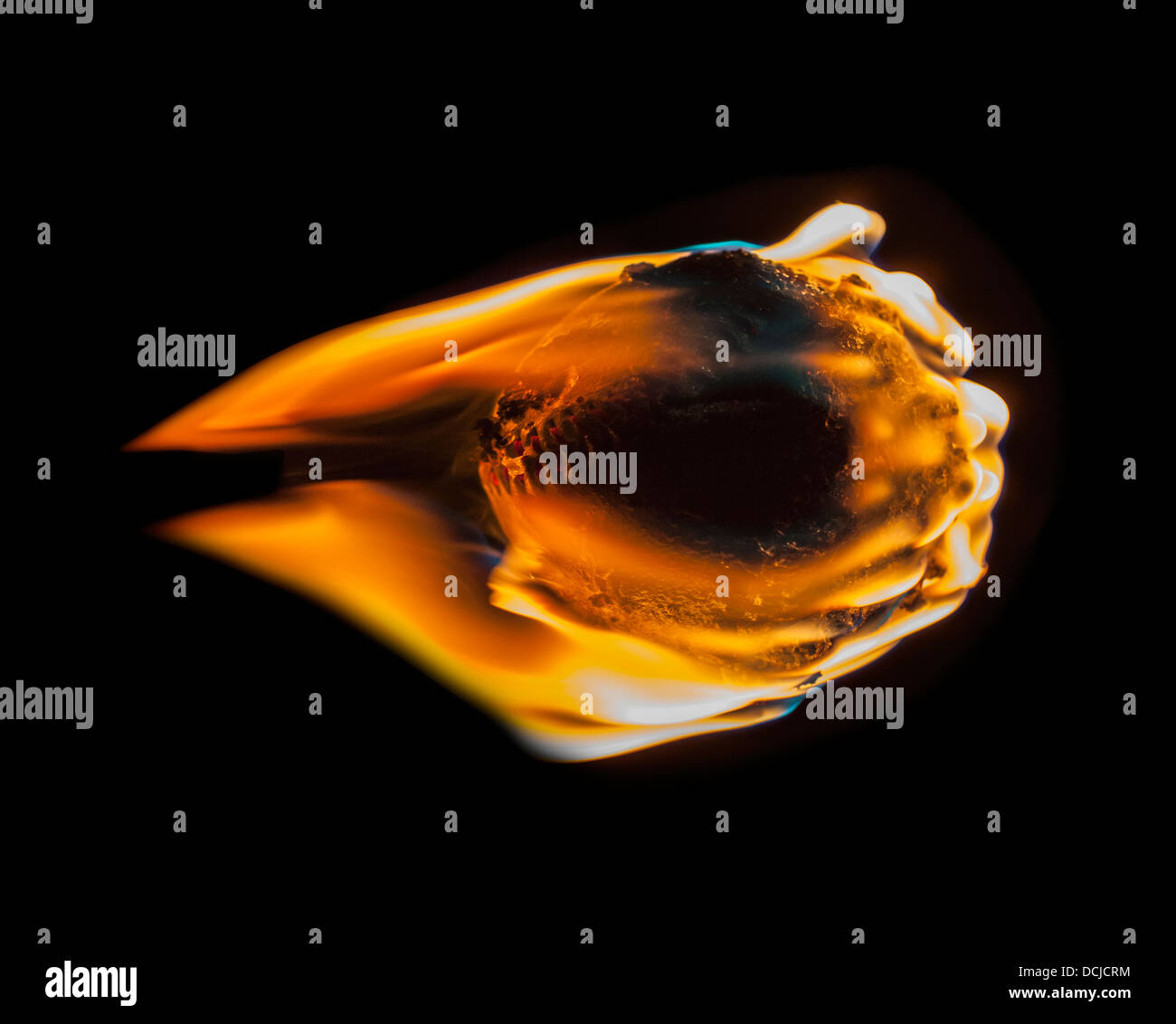 Red hot flaming baseball flying into darkness Stock Photo - Alamy