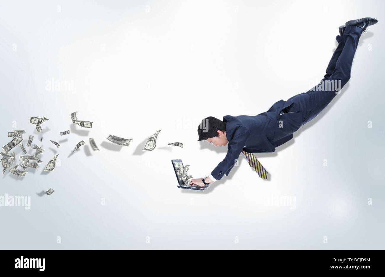 Money coming from laptop hi-res stock photography and images - Alamy