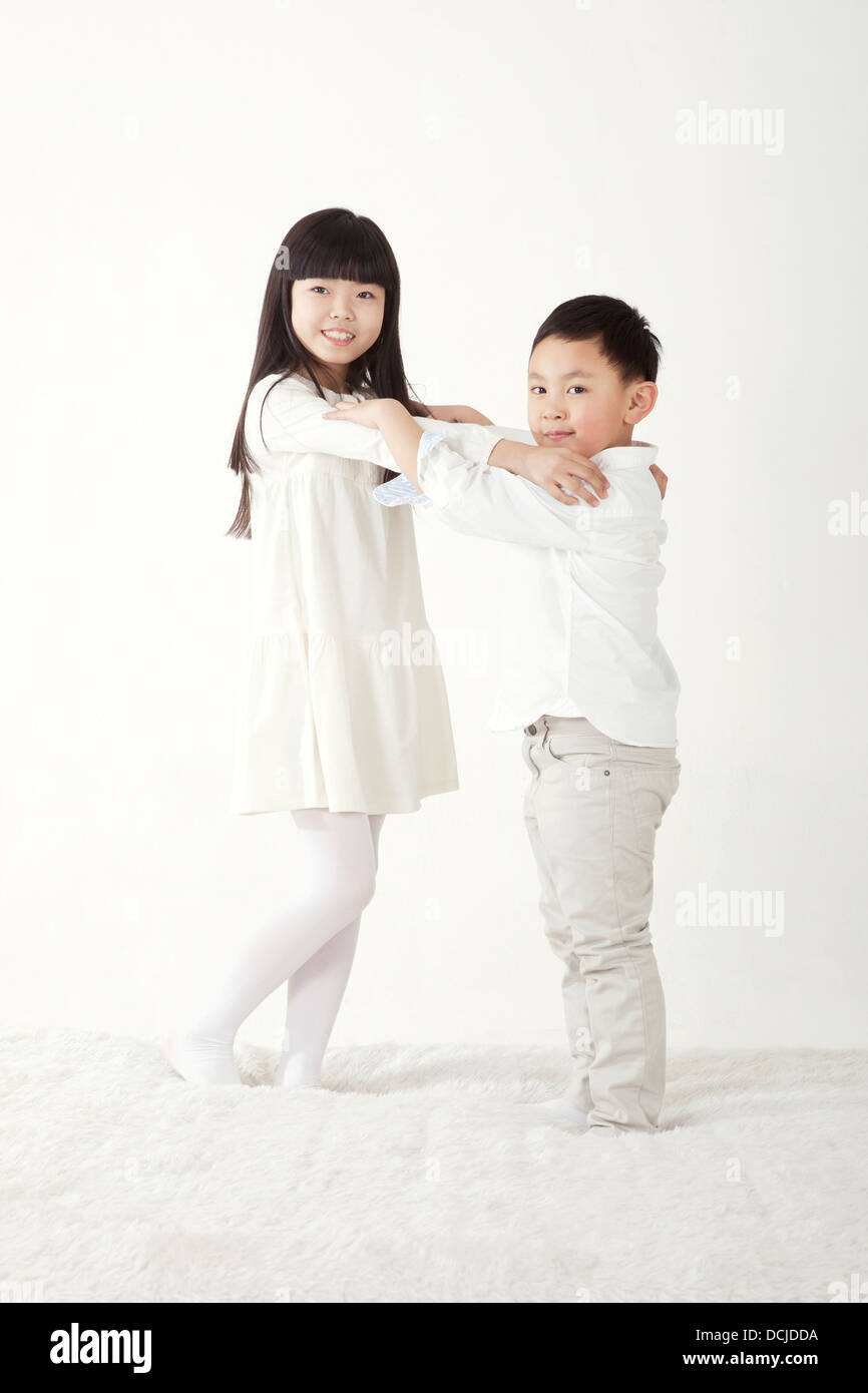 Eastern family of siblings Stock Photo - Alamy