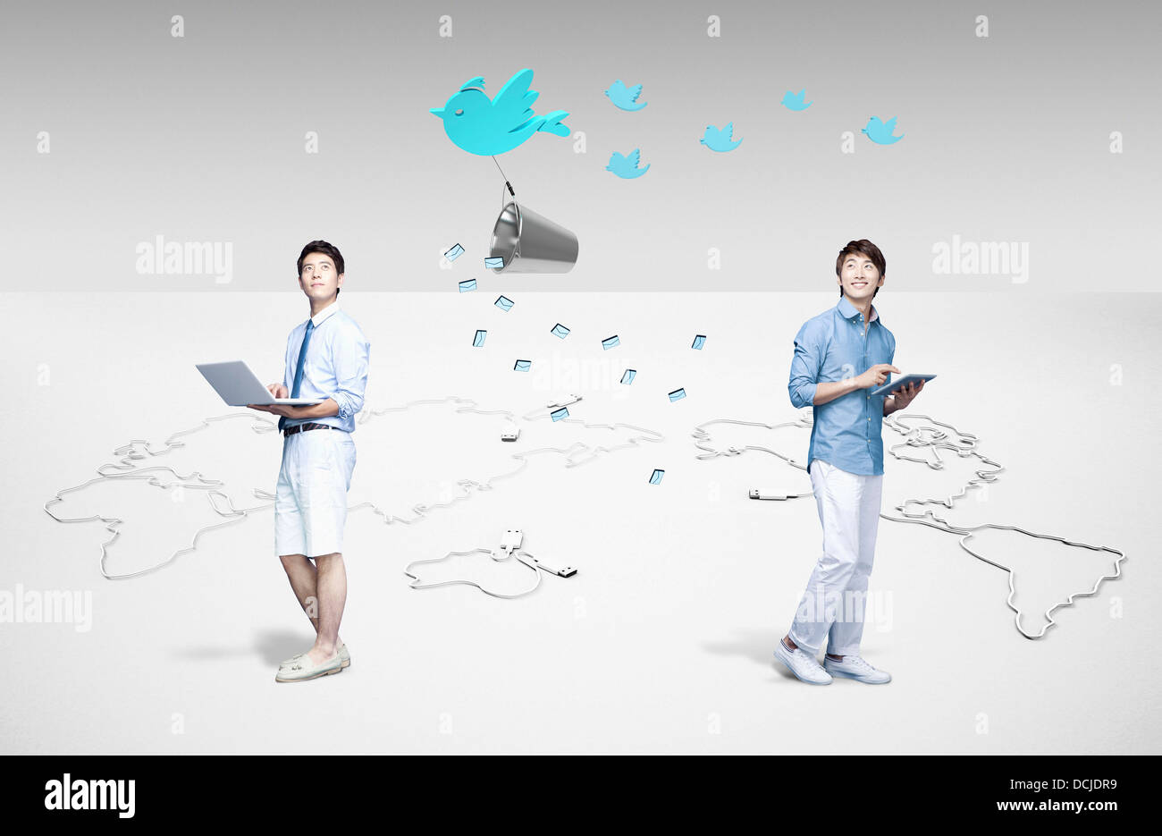 two men standing on the world map Stock Photo - Alamy