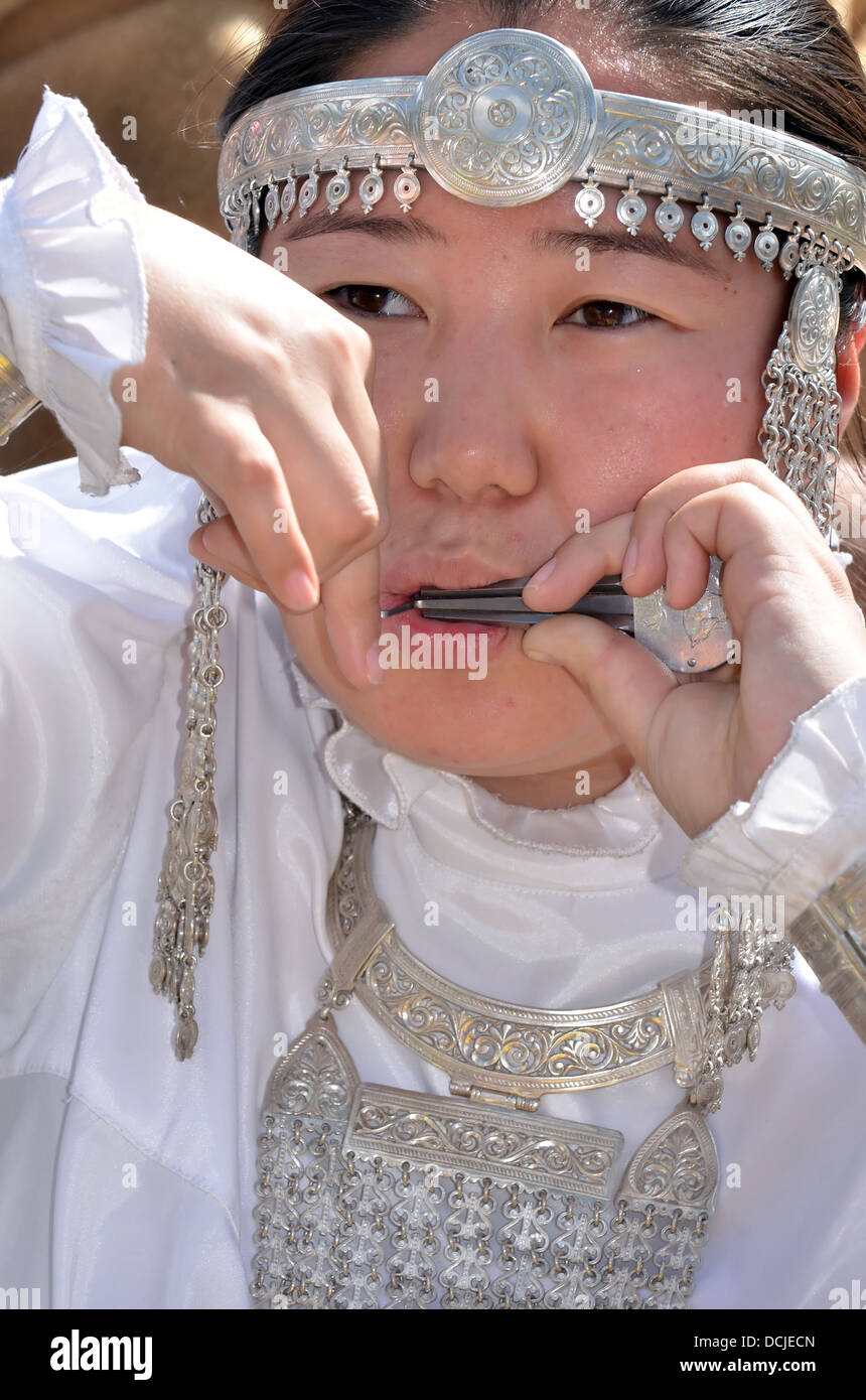 Yakutsk dancers holding ceremonial wooden beakers at the International ...