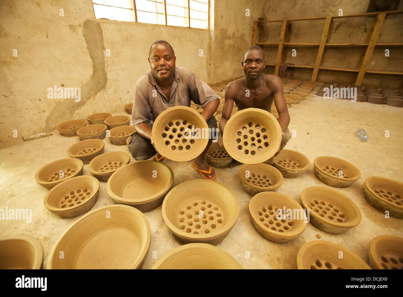Tanzanian potters with clay liners used for the production of african ...