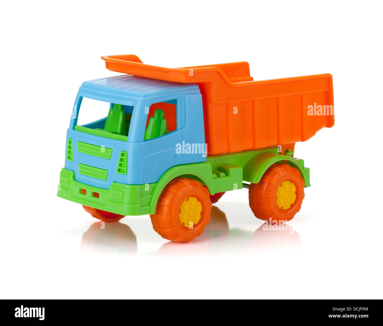 Yellow car on green background Cut Out Stock Images & Pictures - Alamy