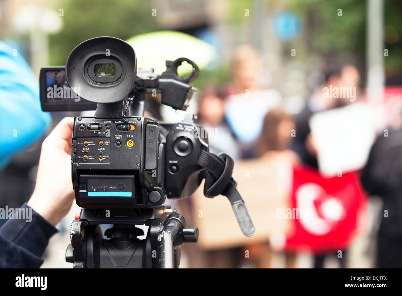covering an event with a video camera Stock Photo - Alamy