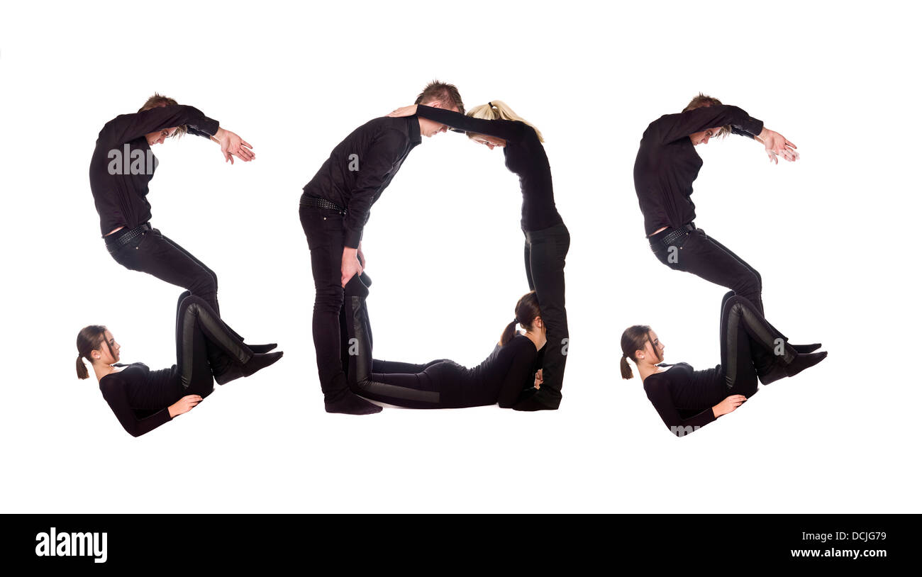 Group of people forming the word 'SOS' Stock Photo - Alamy