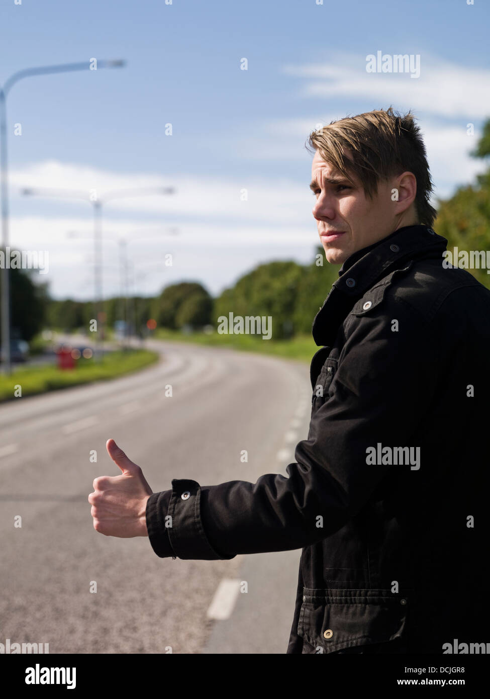 Hitchhiker male hi-res stock photography and images - Alamy