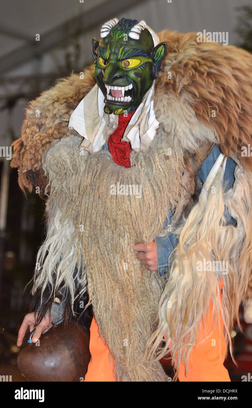 : Swiss pagan monsters at the International Alpine Horn Festival Stock ...