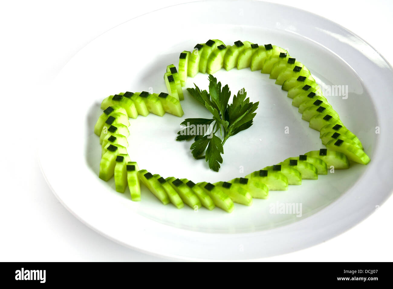 Peel cucumber and cut into pieces in the shape of heart Stock Photo - Alamy