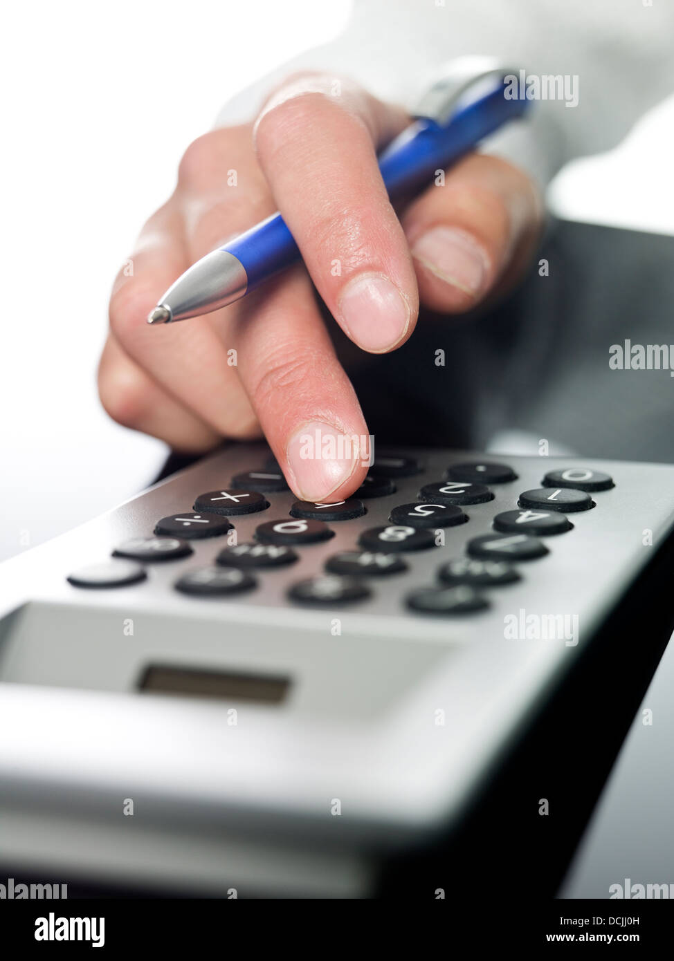 Man doing financial calculations Stock Photo - Alamy