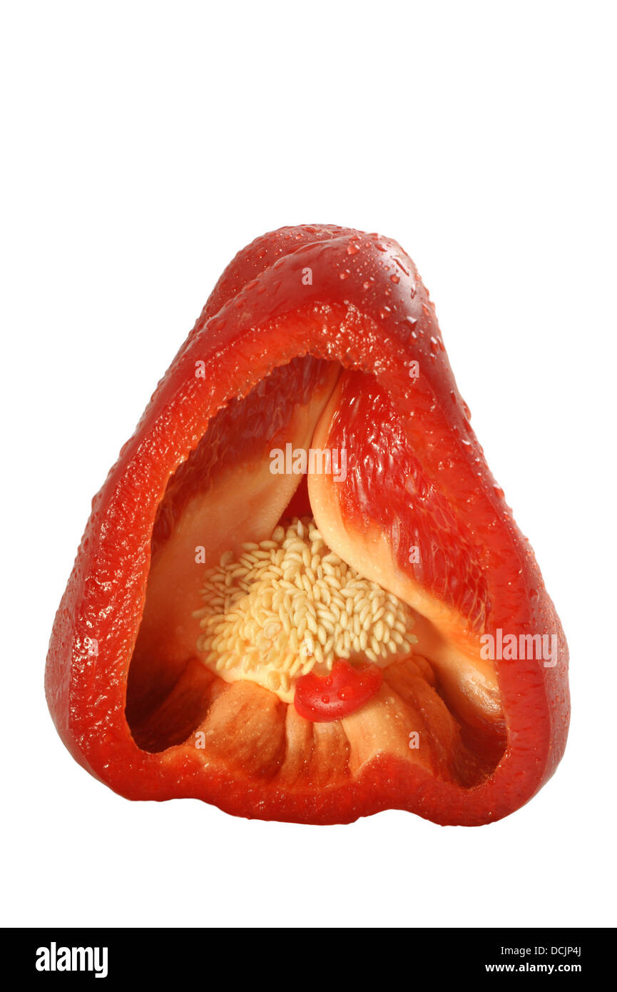open organic red pepper and white background Stock Photo - Alamy