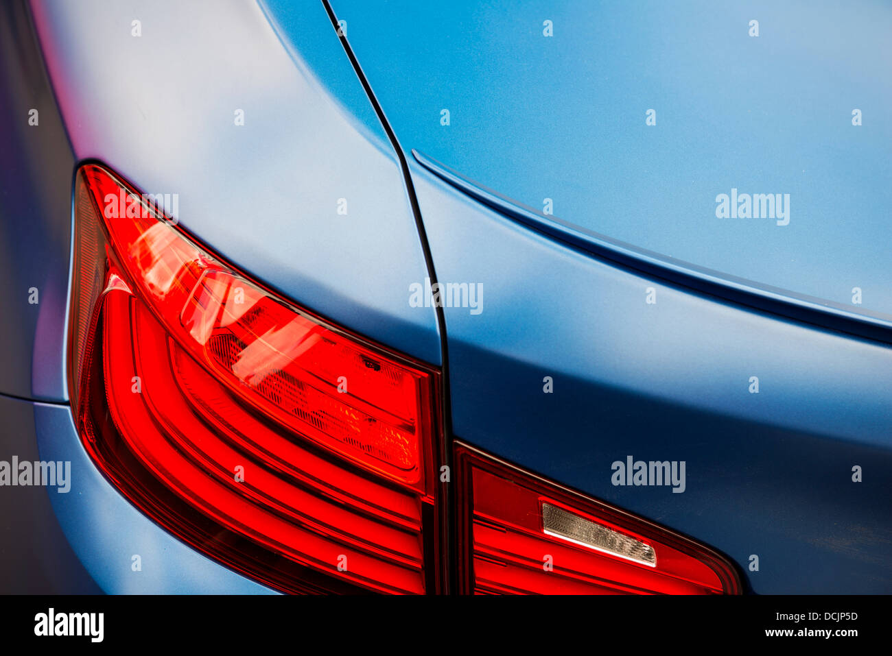 BMW back with rear light and blue matte lacquer Stock Photo - Alamy