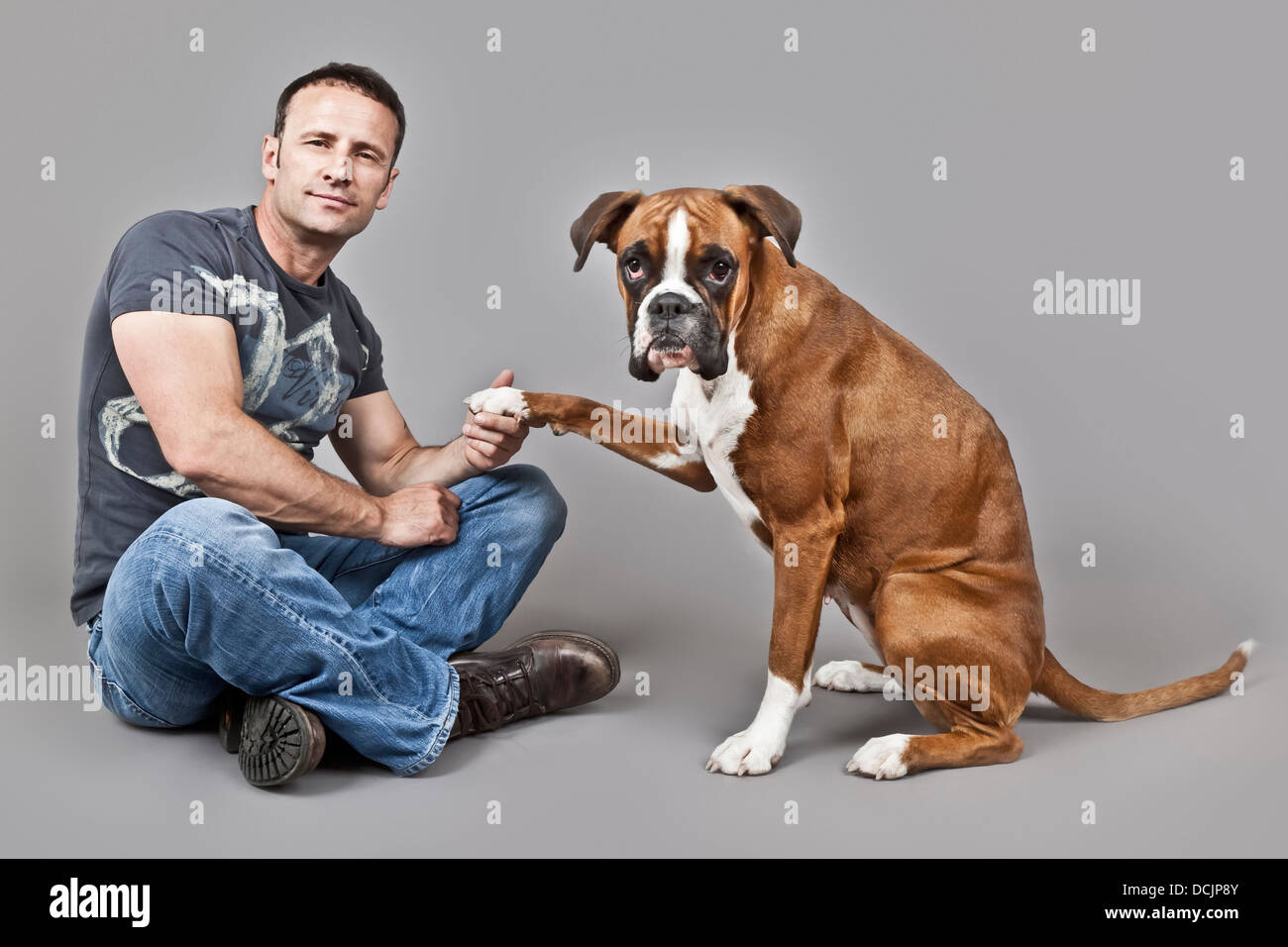 handsome muscle man with his dog Stock Photo - Alamy