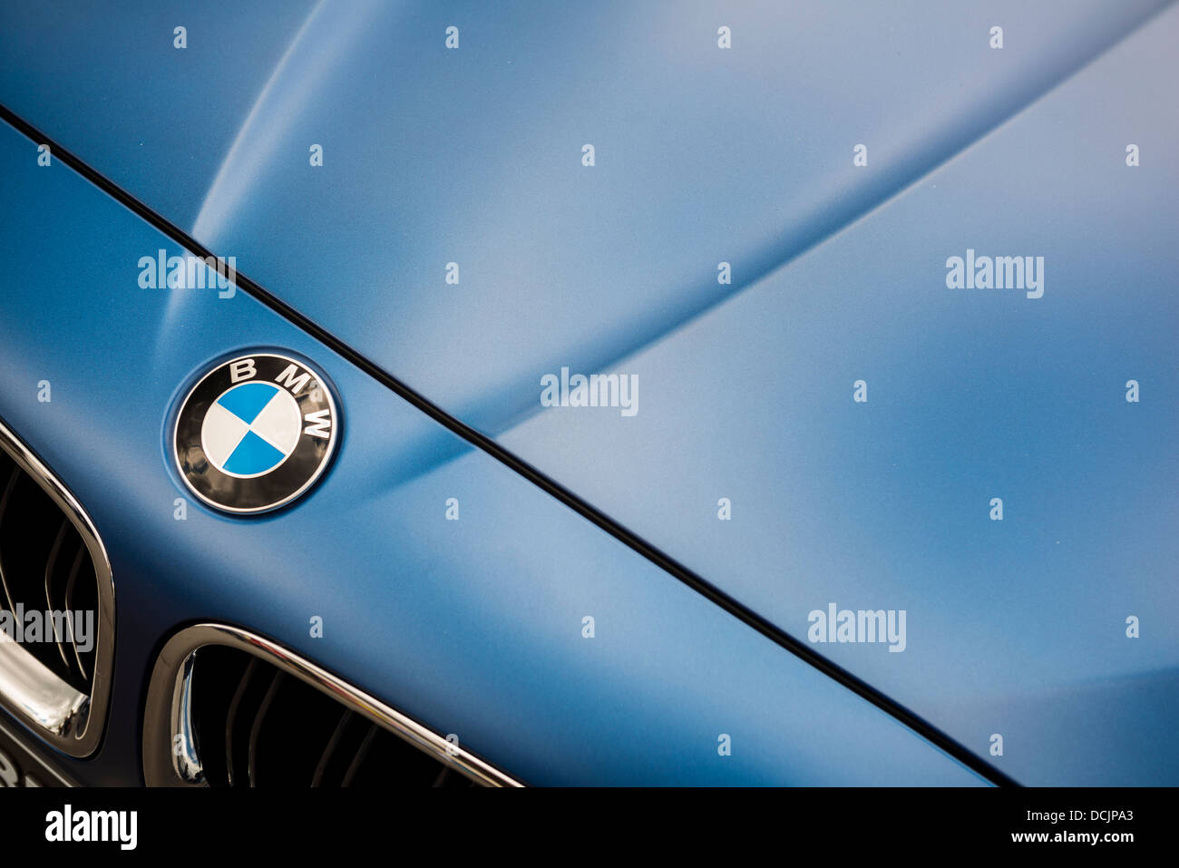 BMW Bonnet with Emblem and blue mat lacquer Stock Photo - Alamy