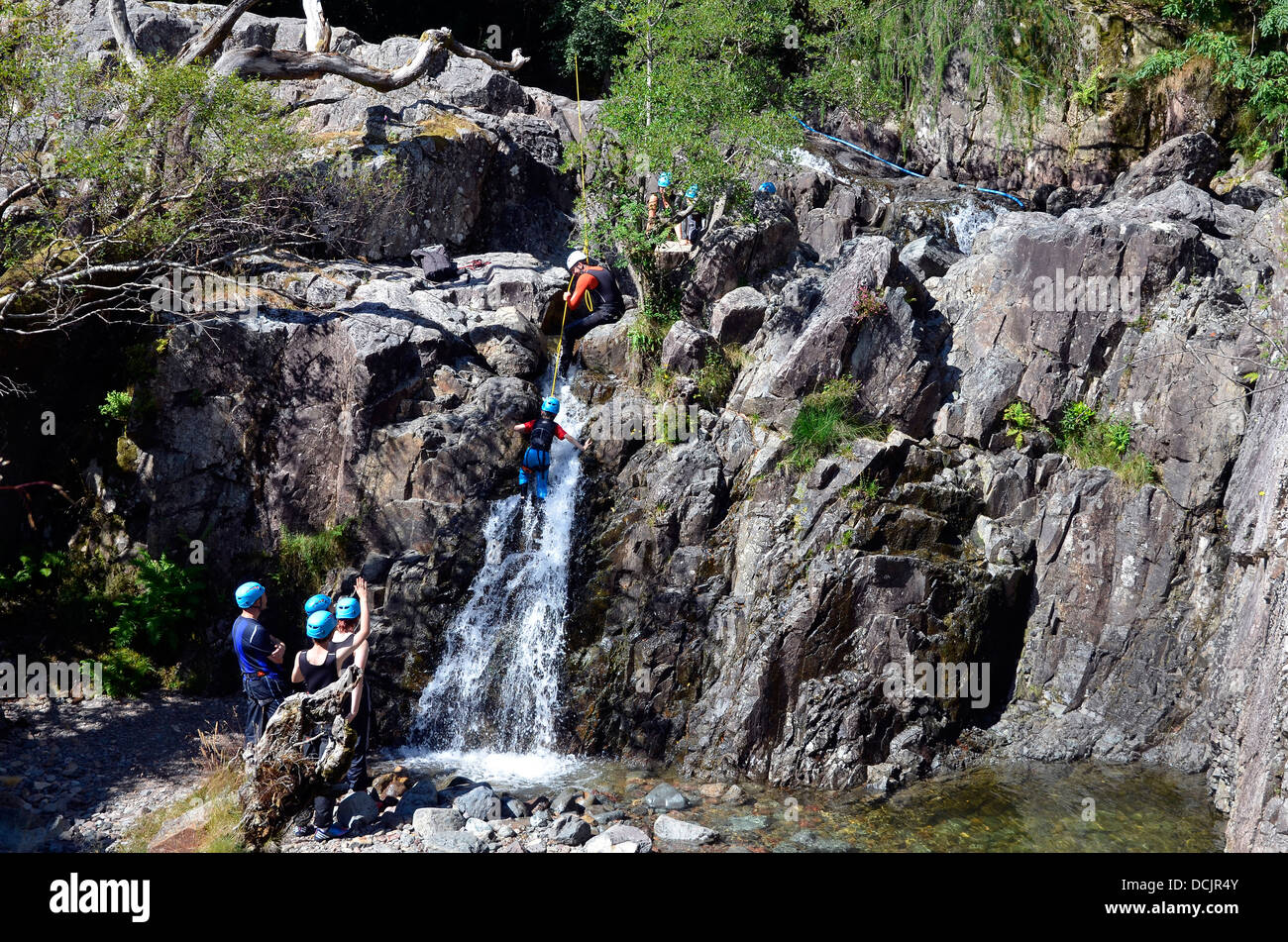 The Stickle Ghyll stream flowing into Langdale - with a youth ...
