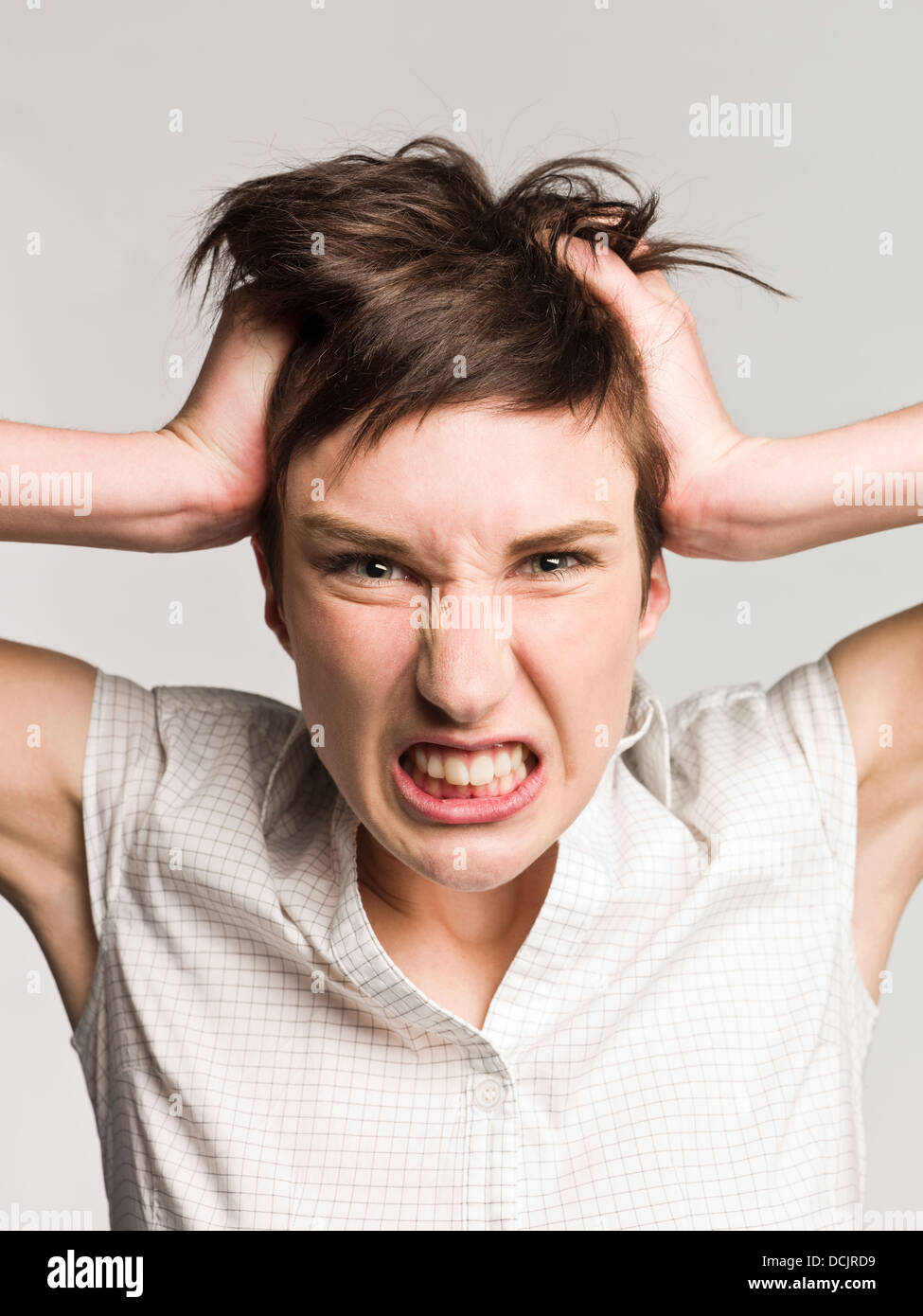Portrait of an angry woman Stock Photo - Alamy