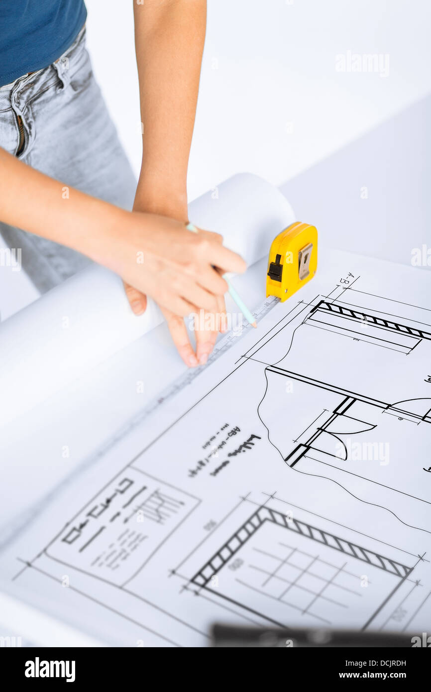 architect drawing on blueprint Stock Photo - Alamy