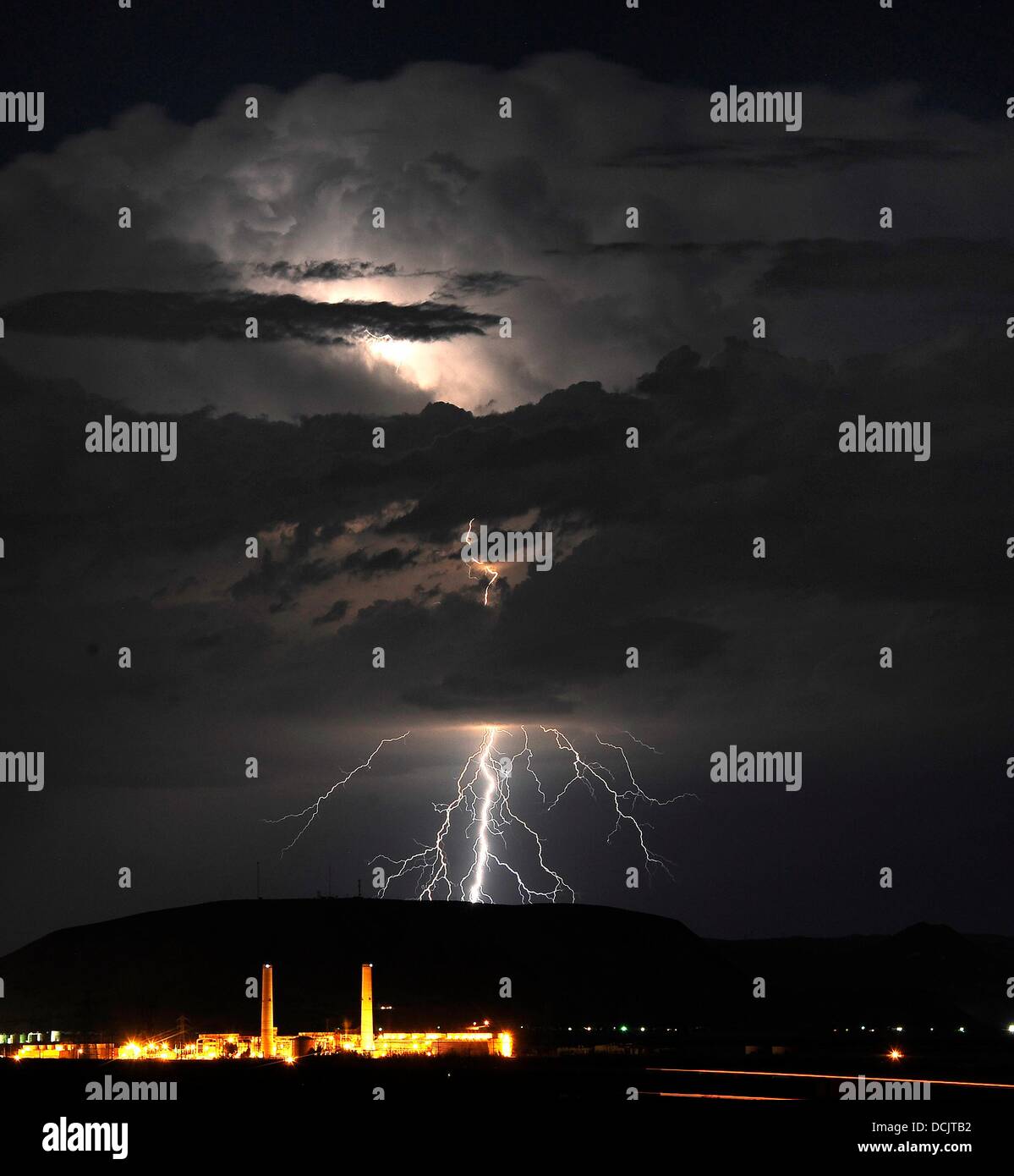 Barstow CA., USA. 19th Aug, 2013. Lightning strikes and thunder and ...