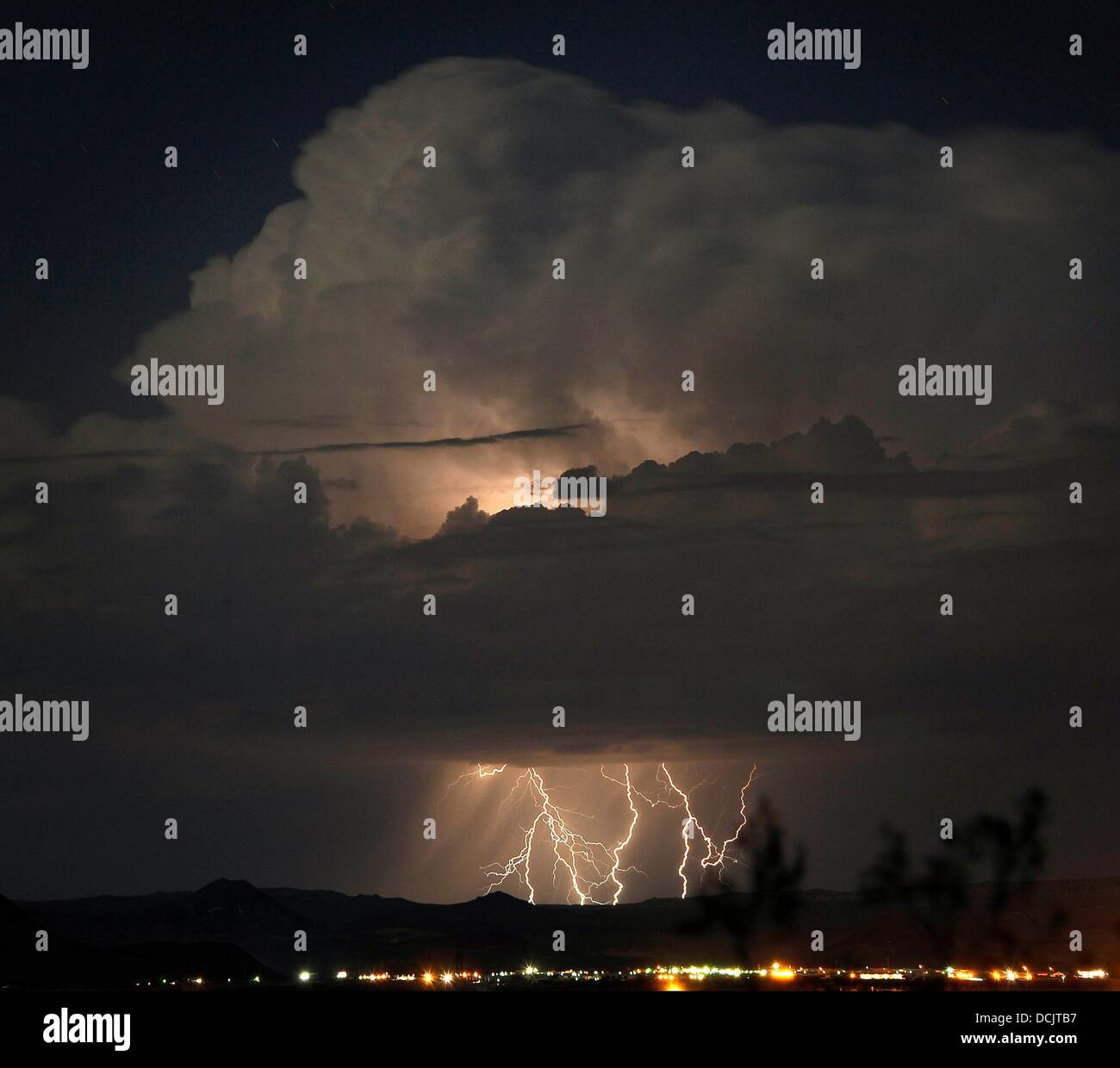 Barstow CA., USA. 19th Aug, 2013. Lightning strikes and thunder and ...