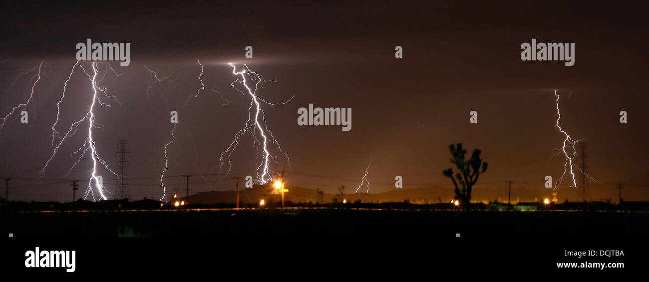 Lake Los Angeles CA., USA. 19th Aug, 2013. Lightning strikes and ...