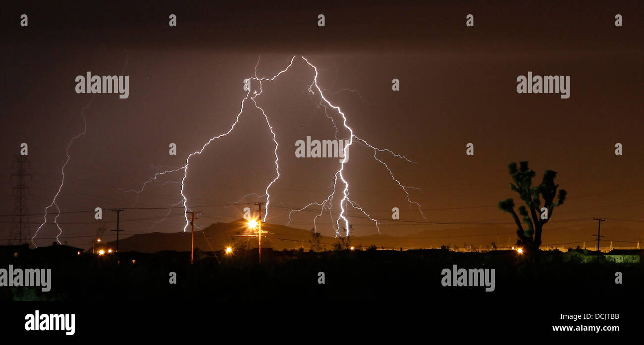Lake Los Angeles CA., USA. 19th Aug, 2013. Lightning strikes and ...