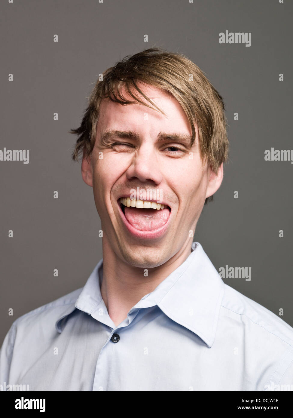 Portrait of a man making a funny face Stock Photo - Alamy
