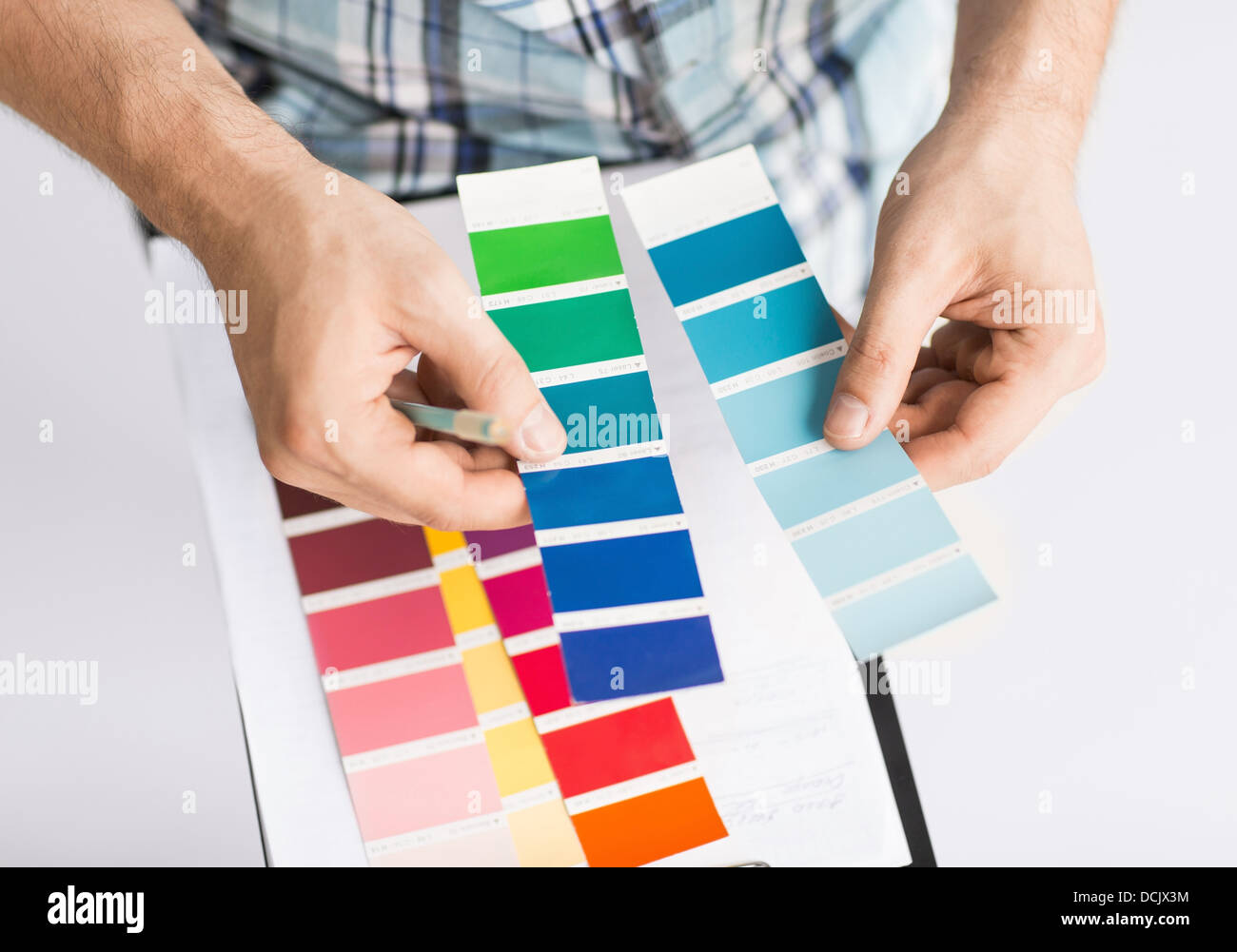 man with color samples for selection Stock Photo - Alamy