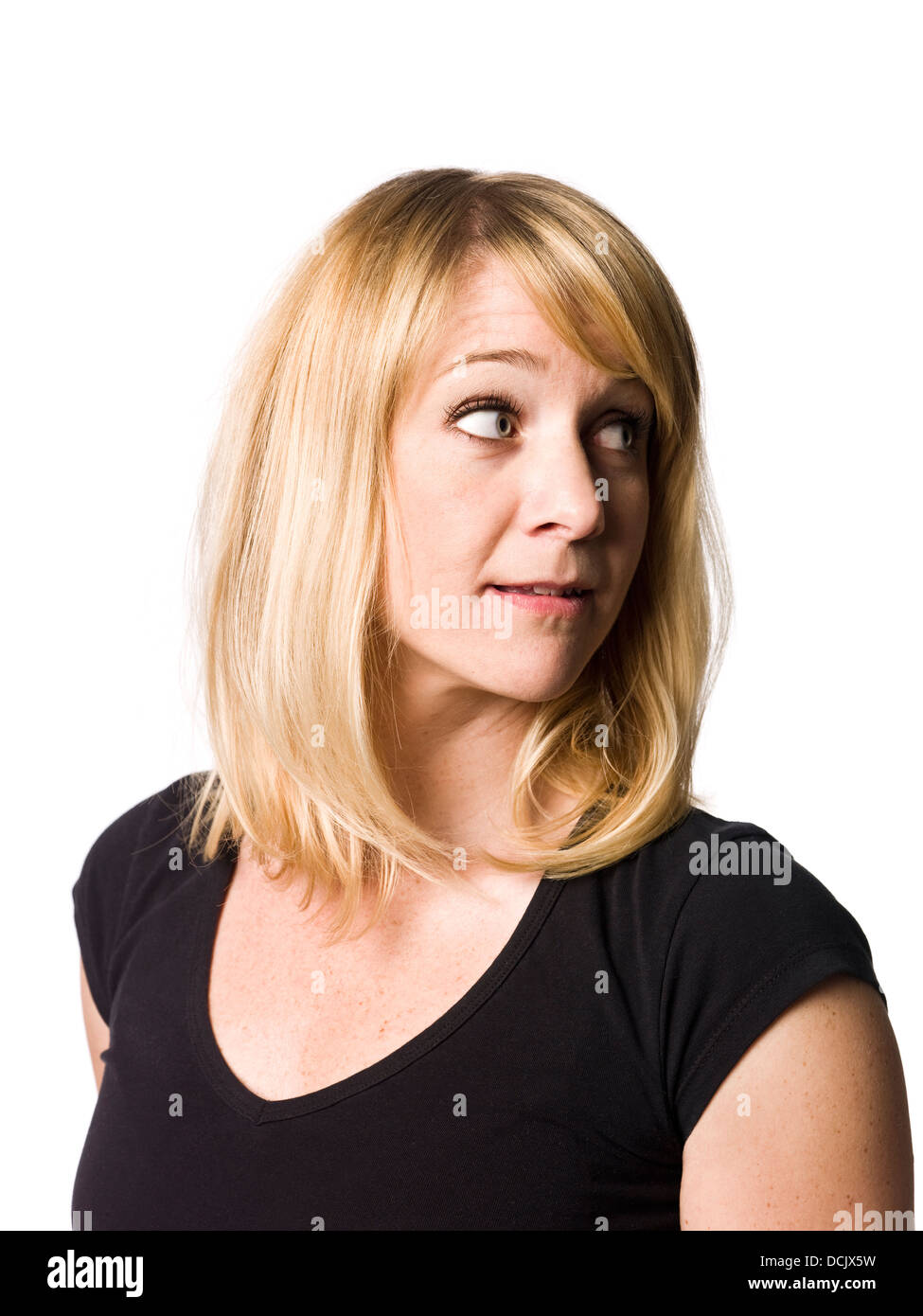 Portrait of a woman looking at the side Stock Photo - Alamy