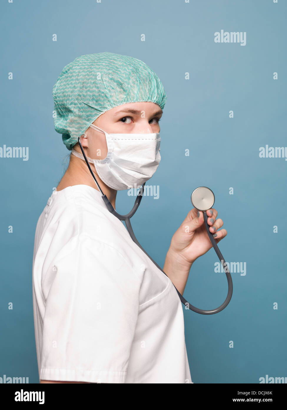 Nurse with surgical mask and a stethoscope Stock Photo - Alamy