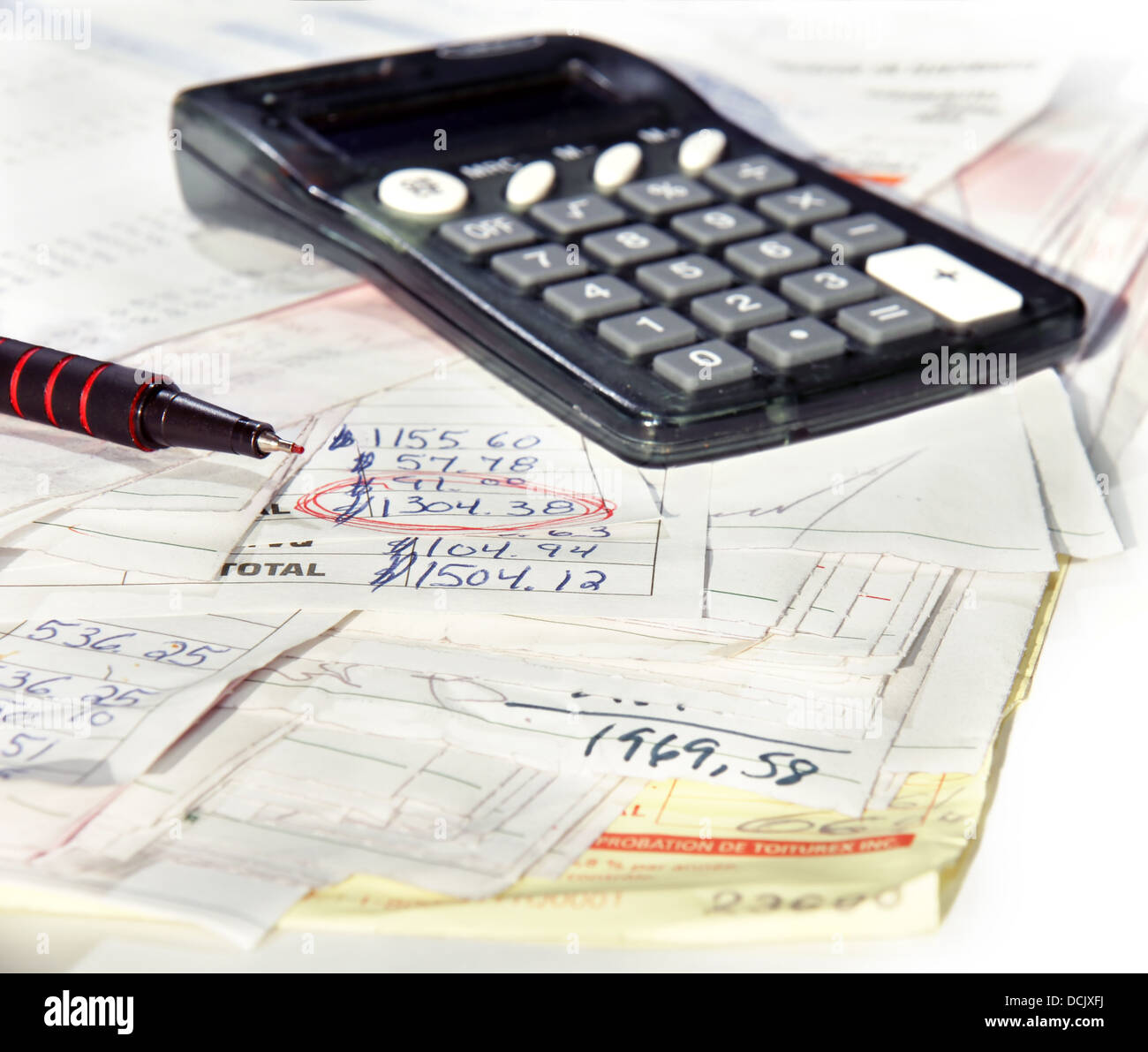 Adding the bills Stock Photo - Alamy