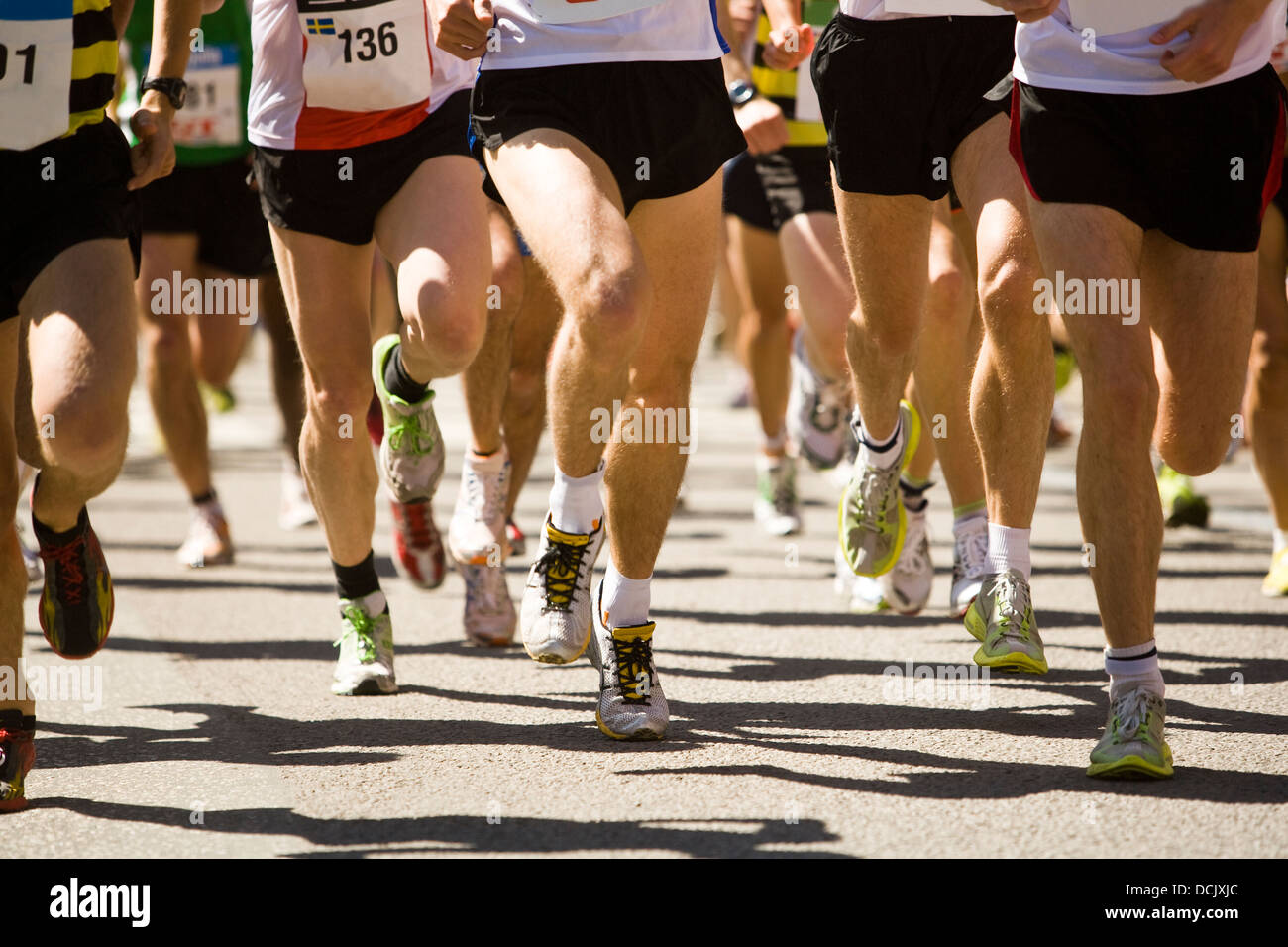 Lots of people running in a sports game Stock Photo - Alamy