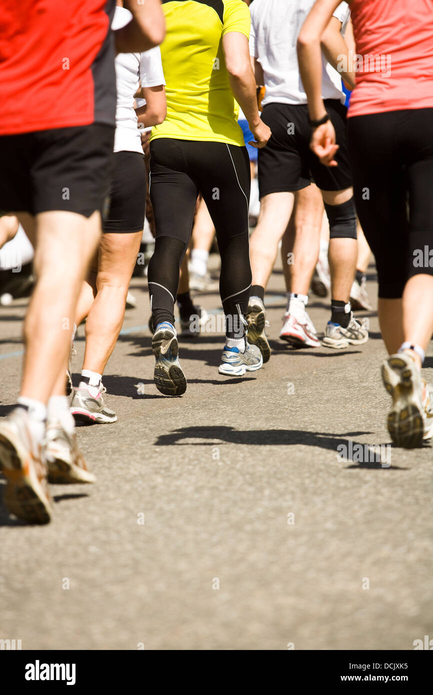 Lots of people running in a sports game Stock Photo - Alamy