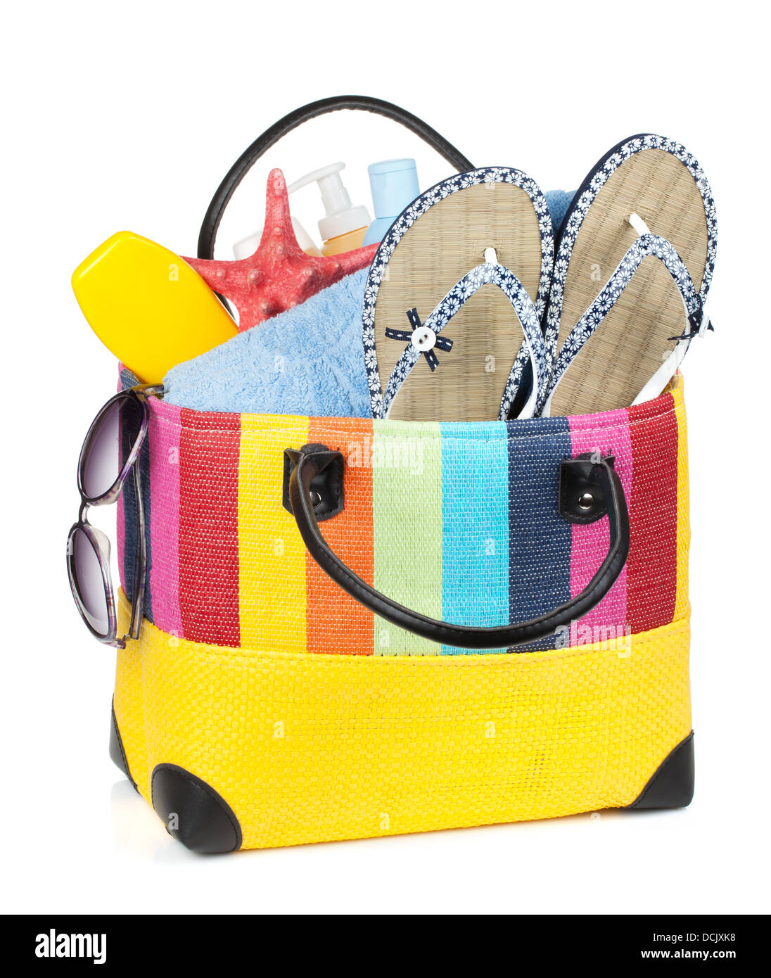 Bag with towels, sunglasses, flip-flops and beach items. Isolated on ...