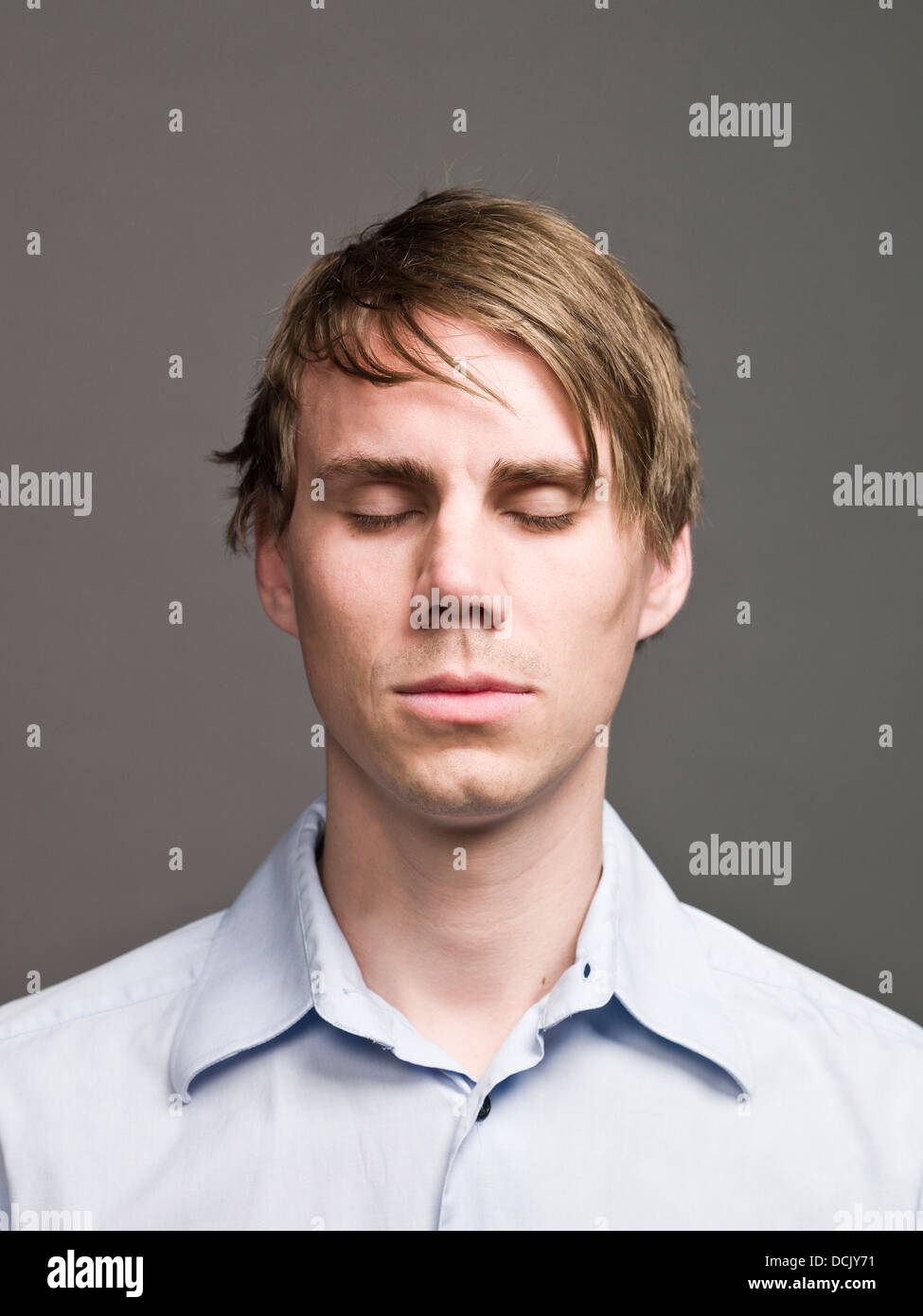 Portrait of a man with closed eyes Stock Photo - Alamy