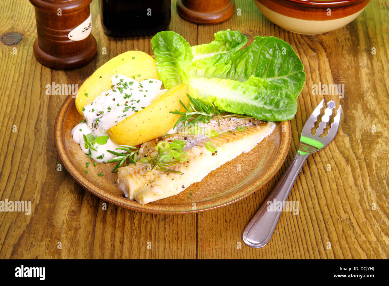 Fish, potato with cottage cheese, salad and fork, close up Stock Photo ...