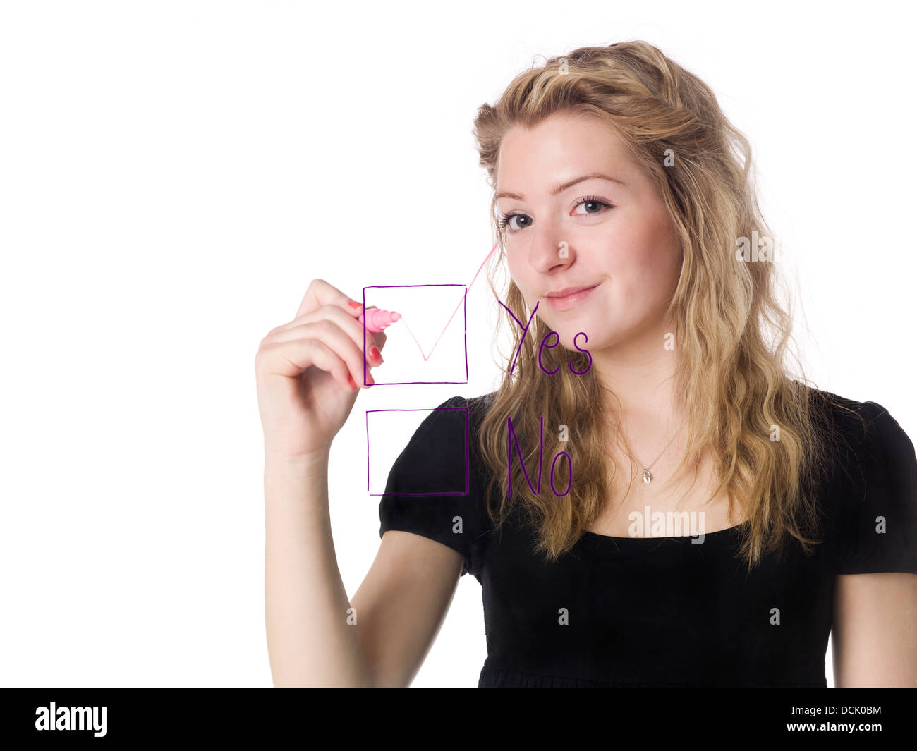 Girl filling in the yes-box Stock Photo - Alamy