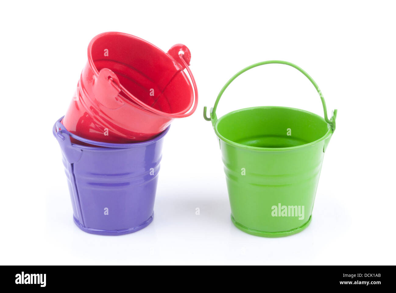 Three buckets of different colors, isolated on white background Stock ...