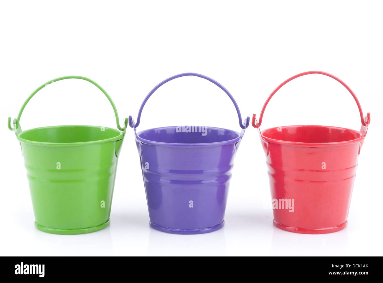 Three buckets of different colors, isolated on white background Stock ...