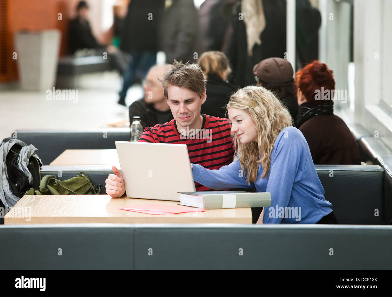 Couple in front of a computer Stock Photo - Alamy