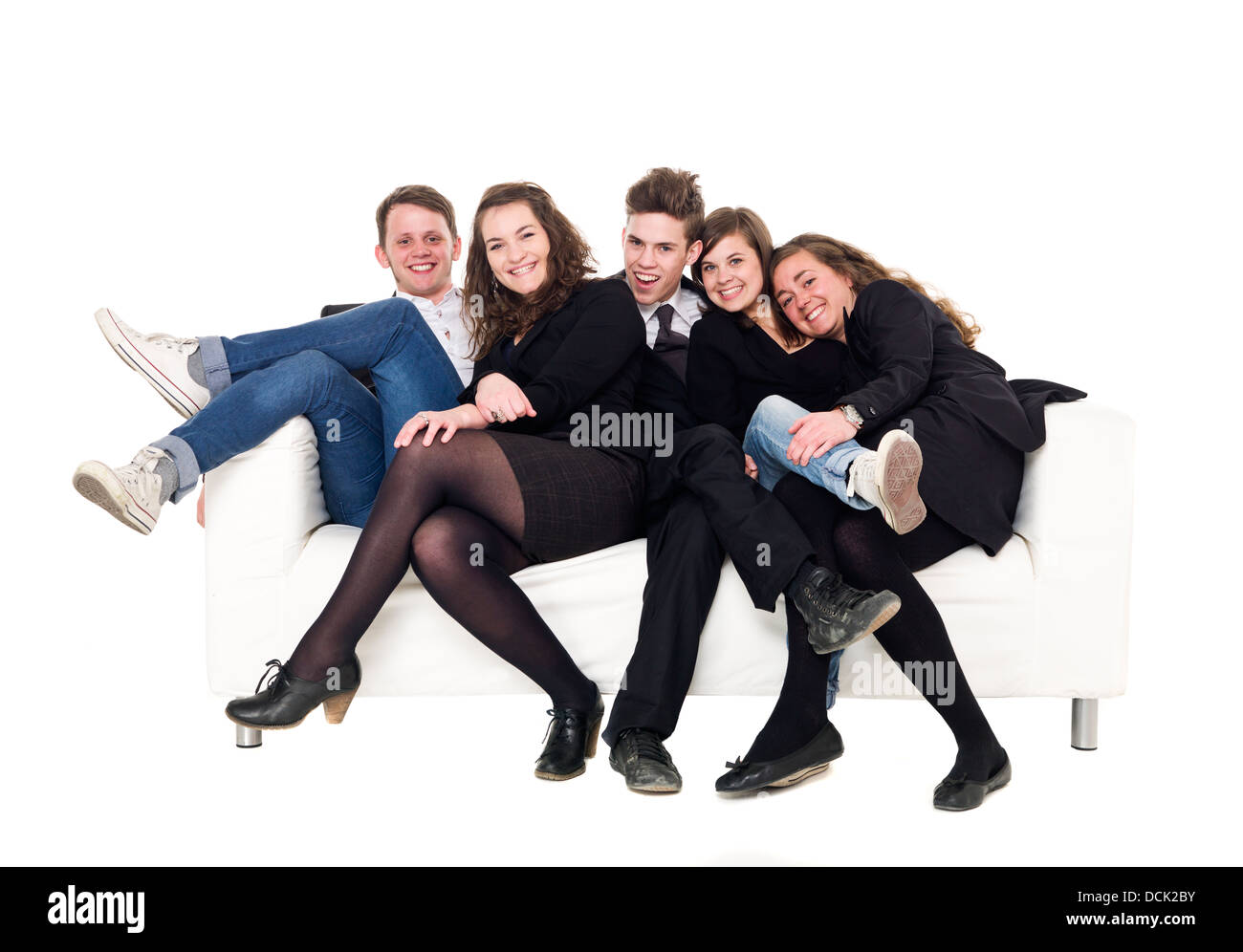 Group of people in a sofa Stock Photo - Alamy