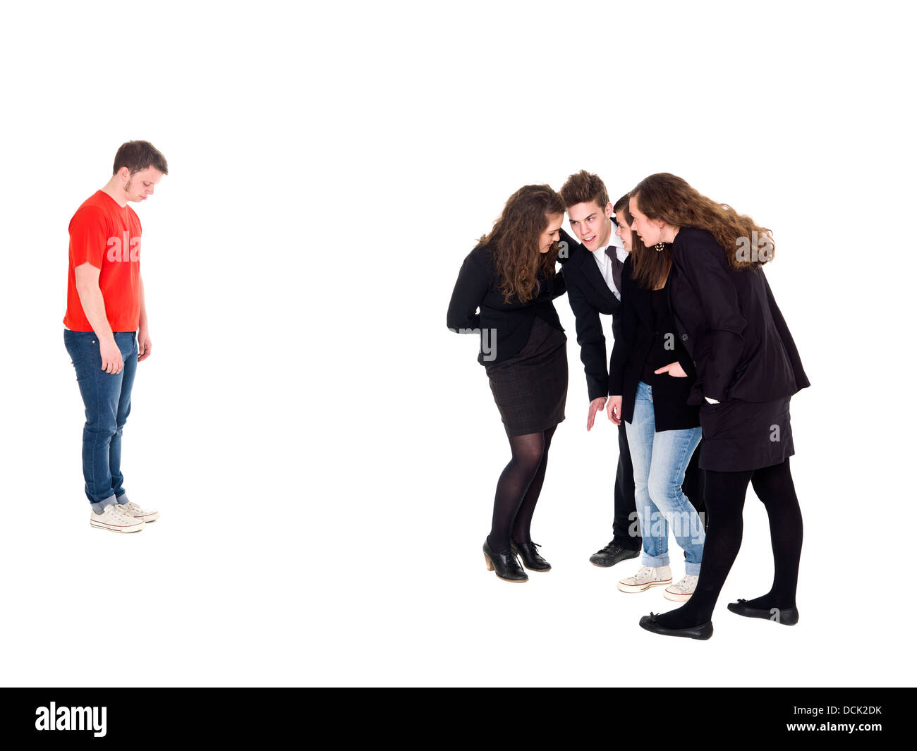 Young man rejected from the group Stock Photo - Alamy