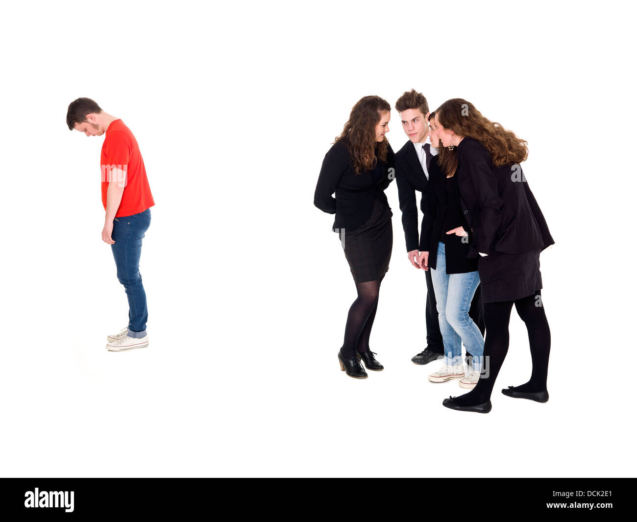 Young man rejected from the group Stock Photo - Alamy
