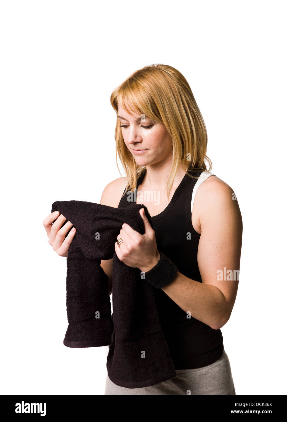 Girl drying herself with a towel Stock Photo - Alamy