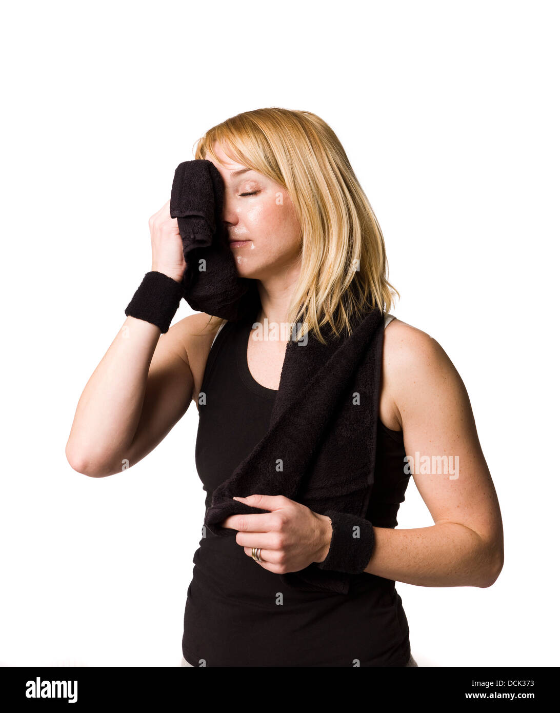 Girl drying herself with a towel Stock Photo - Alamy