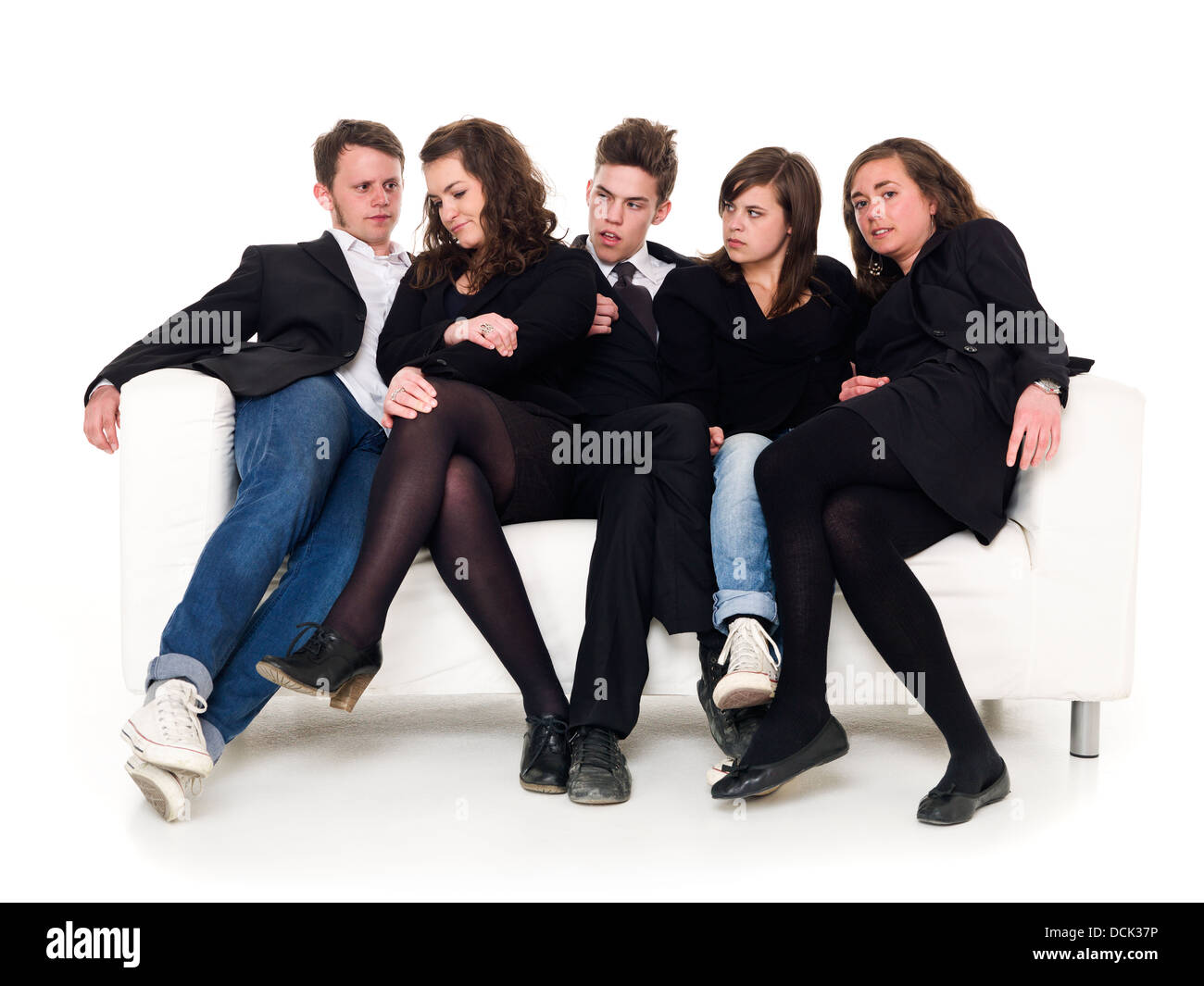 Group of people in a sofa Stock Photo - Alamy