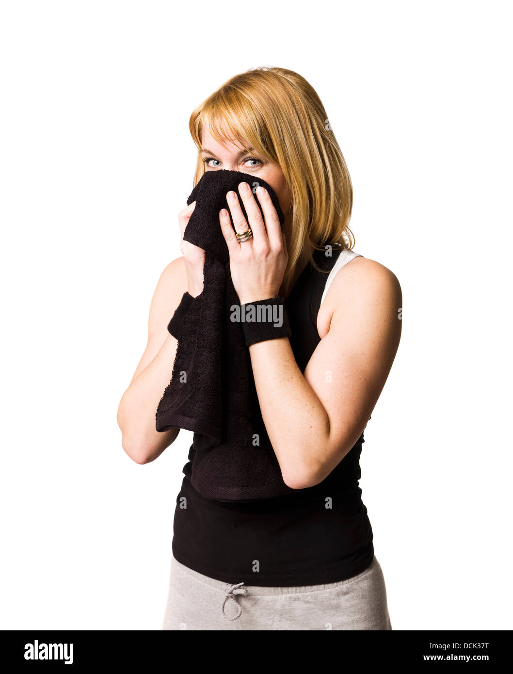 Girl drying herself with a towel Stock Photo - Alamy