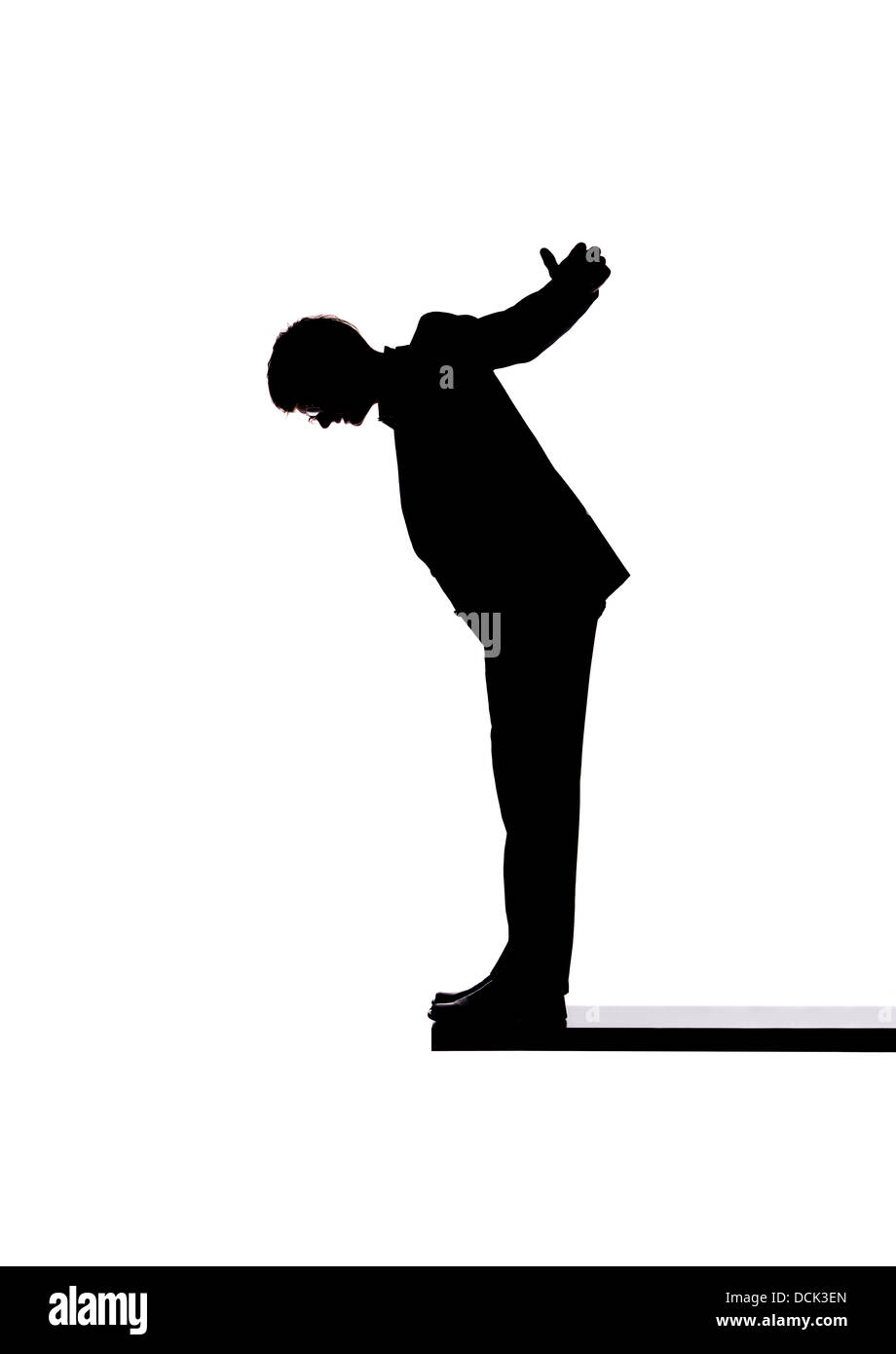 Man losing his balance Stock Photo - Alamy