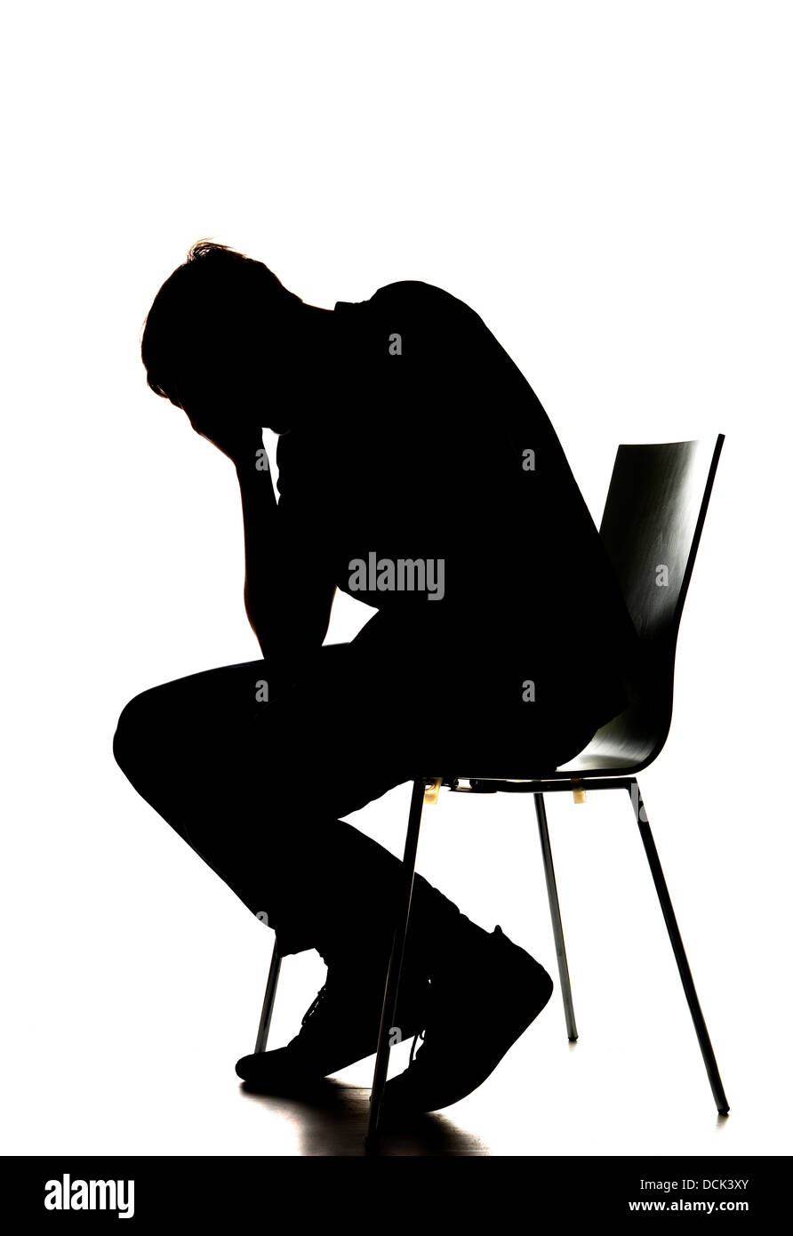 silhouette of a sad man Stock Photo - Alamy